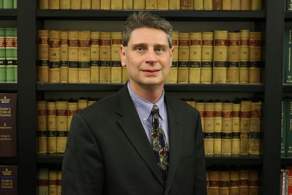 Christopher S. Tretola | Hartman Duff, LLC